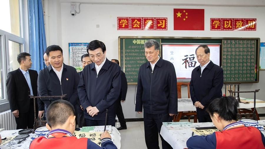 Wang Huning betont Aufbau eines starken Gemeinschaftsgefühls für die ...